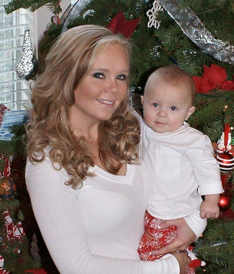 Photo of baby sleeping on Santa goes viral