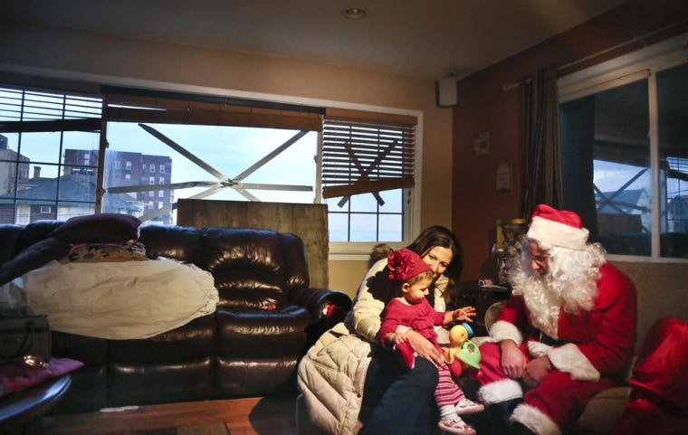 'Sandy Claus' delivers toys to storm-stricken kids