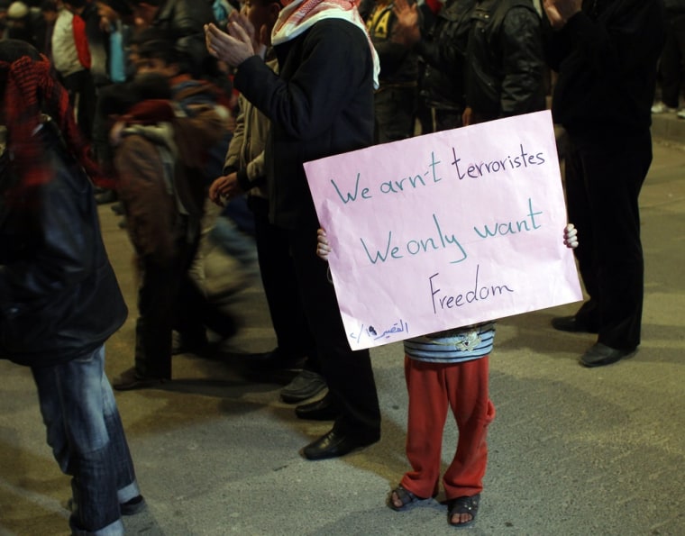 Syrian resistance fights government as civilians flee and mourn deaths