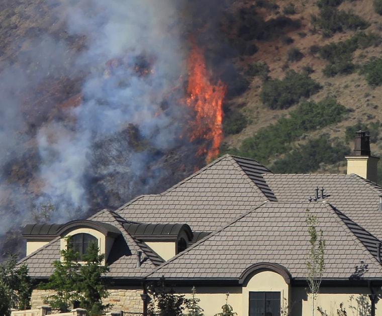 Wildfires continue to burn in Western states
