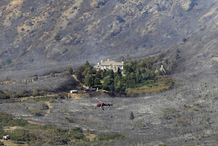 Wildfires continue to burn in Western states