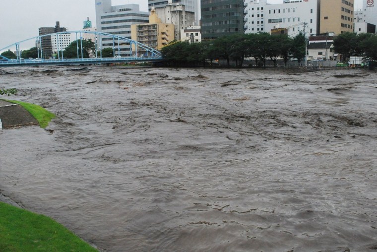 Flash floods in Japan leave trail of destruction