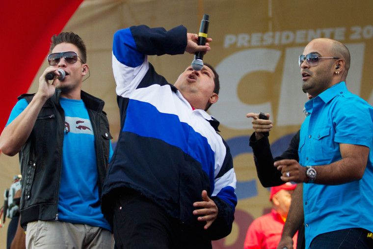 Hugo Chavez sings at election rally