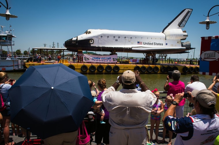 Space shuttle replica floats into Houston's Clear Lake