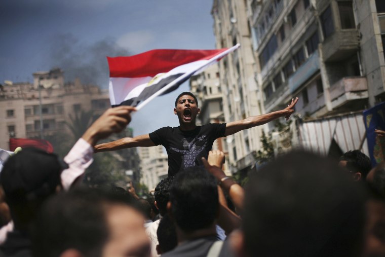 Egyptians protest against old regime day before presidential election