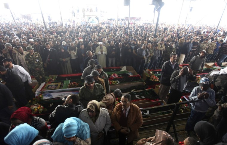 Thousands at funeral after bodies unearthed in Libyan mass grave