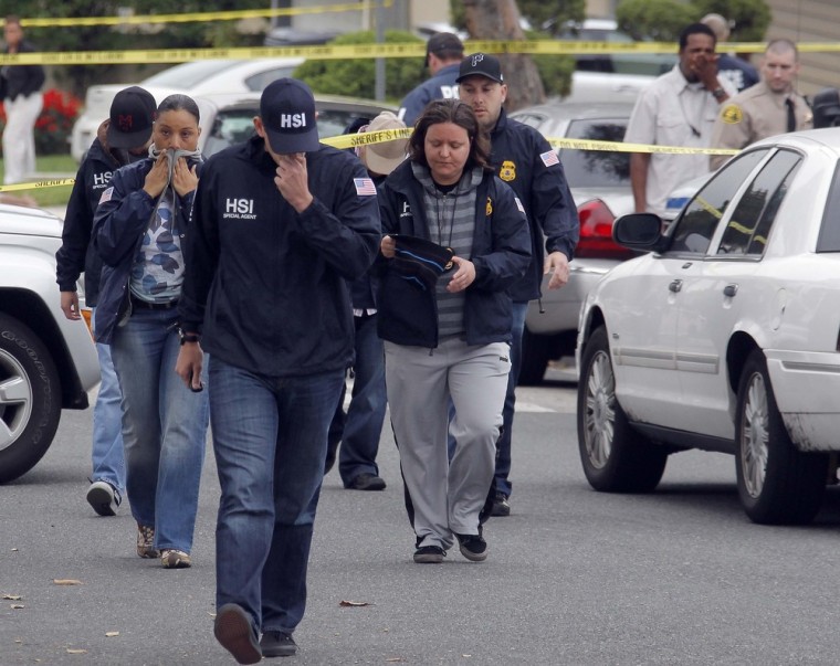 14-year-old son arrested in ICE agent's slaying