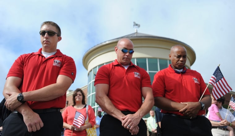 Heads bowed and hands raised for National Day of Prayer