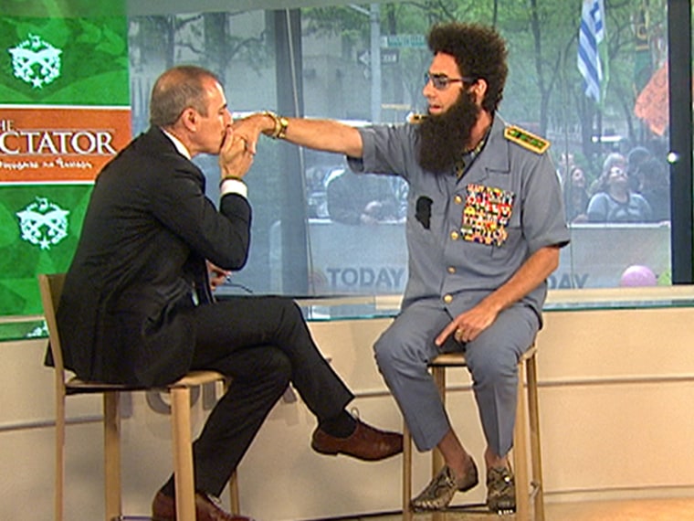 Now THAT'S an entrance: 'The Dictator' arrives, brings the big guns