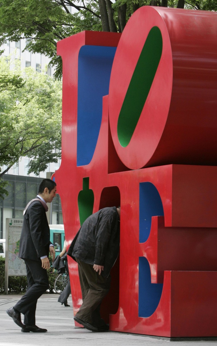 Artist who created 'Love' sculpture renounces other work, gets sued