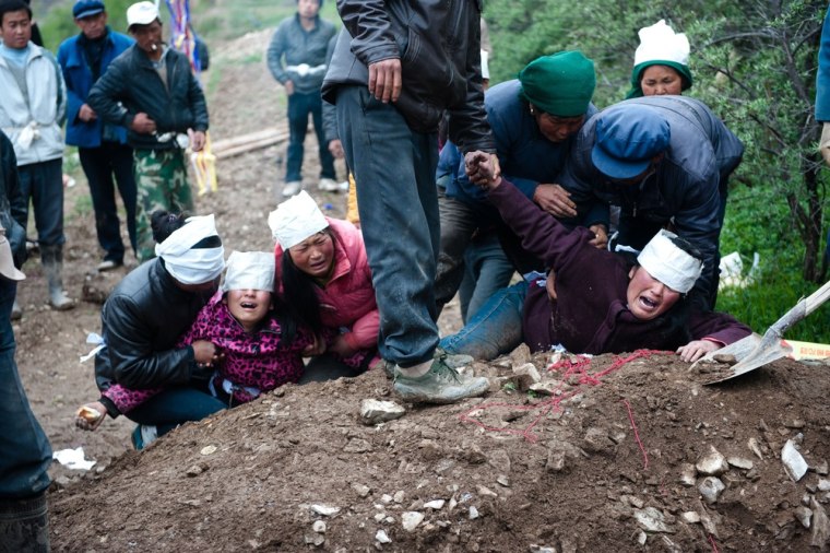 Families grieve after 40 killed in deadly China storms