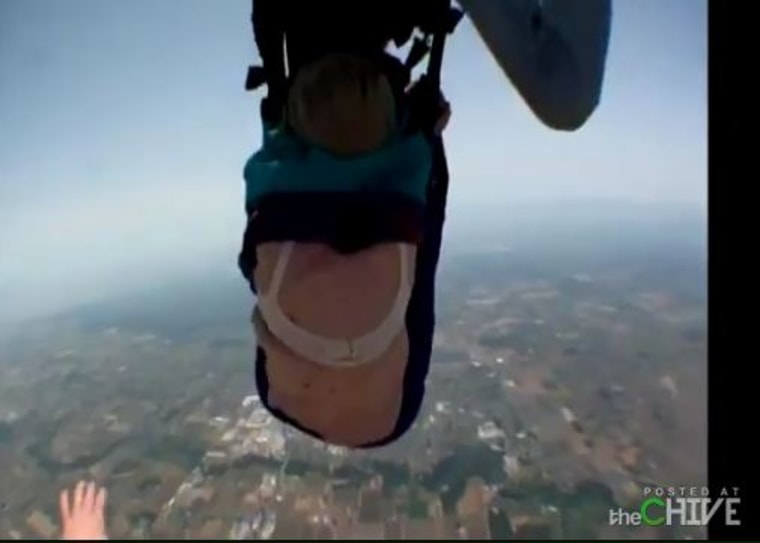 Video shows woman, 80, nearly falling out of parachute harness