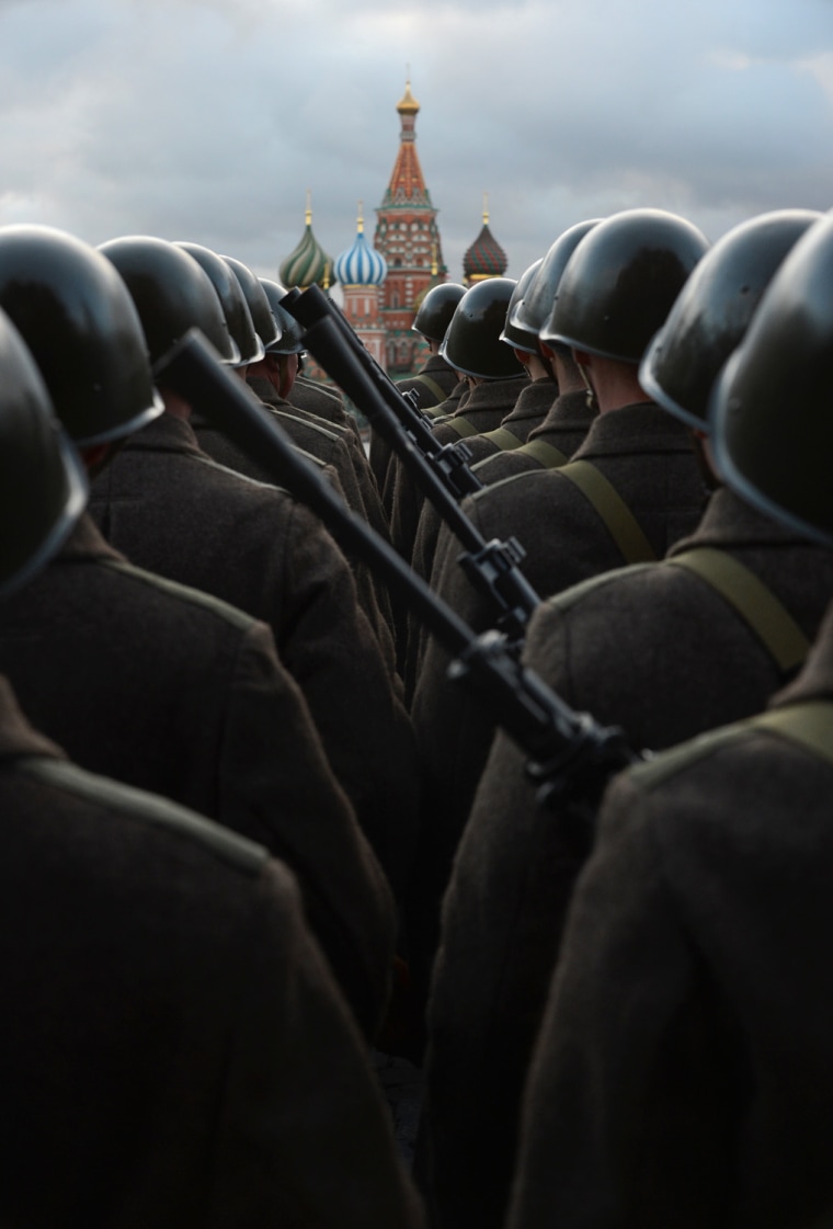 In a grand display, Russian soldiers re-enact historic World War II march