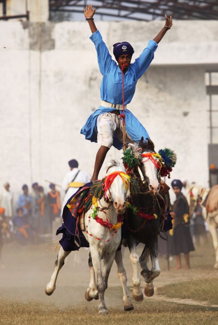 Sikh warriors show off their skills during Mohalla