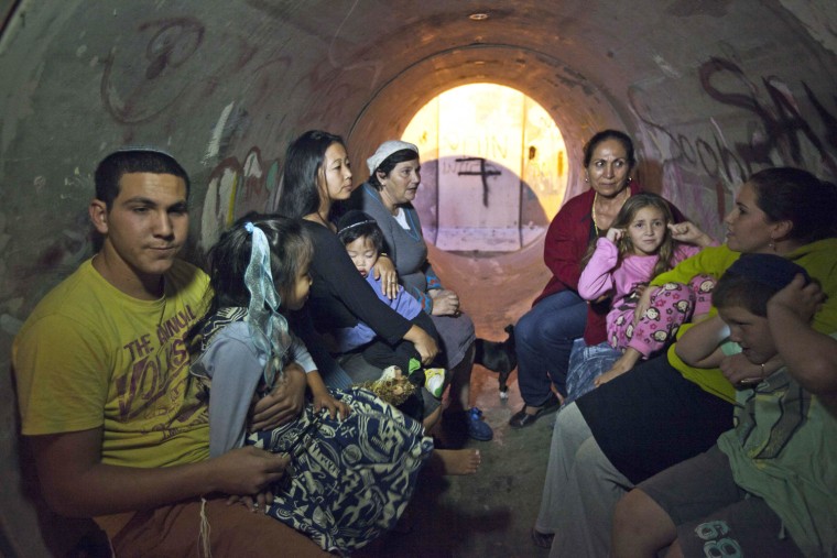 Israelis take shelter in pipes as rocket fire continues from Gaza Israelis take shelter in pipes as rocket fire continues from Gaza