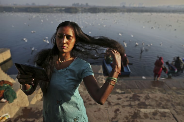 In a dirty, polluted river, prayers are offered