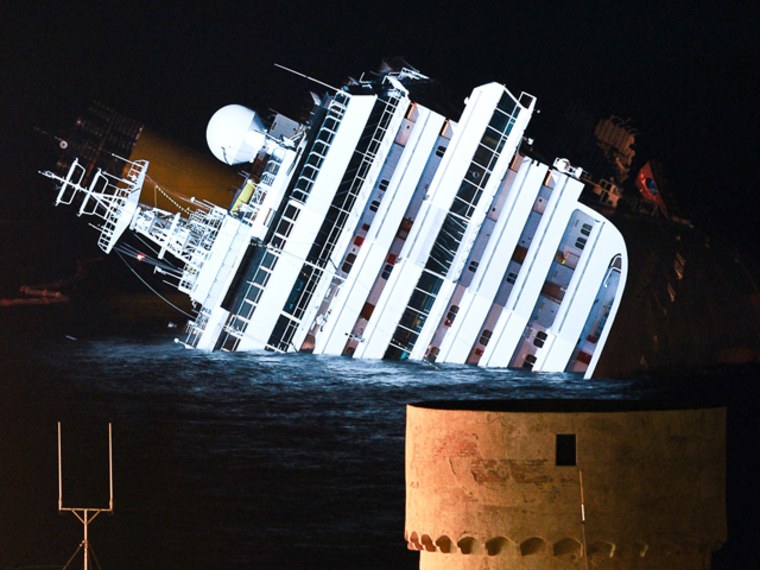Searchers blast holes to access Costa Concordia shipwreck in Italy