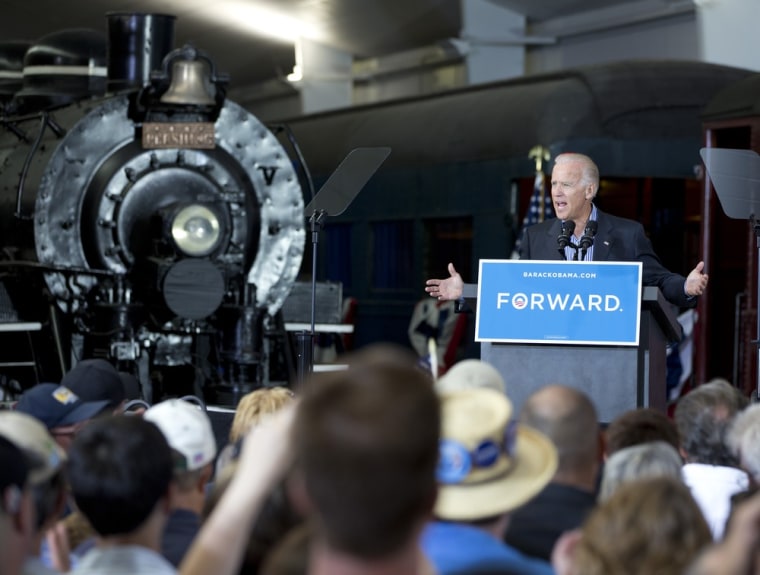 In Ryan's home state, Biden delights in trains, football and taking on Ryan