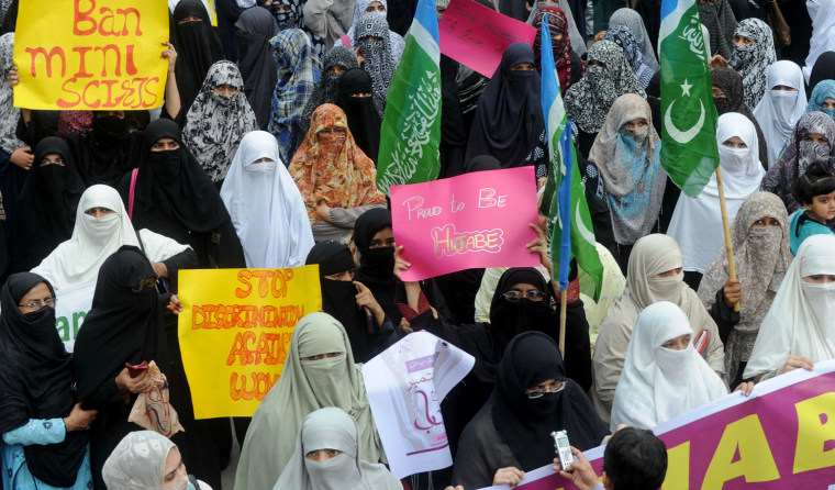 Veiled women in Pakistan rally for the hijab