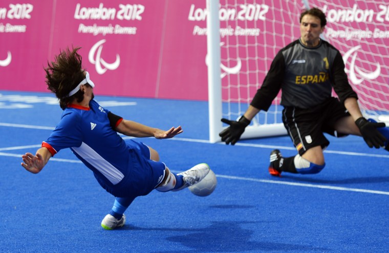 Goa-l-l-l!! Blind soccer star plays it by ear to score at the Paralympics