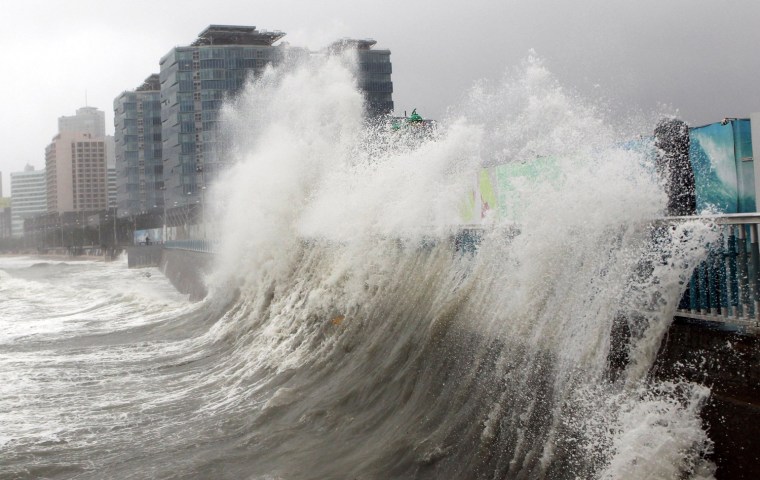 Typhoon Sanba rocks South Korea with huge waves