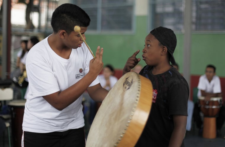 Deaf musicians play to the beat of the drums in Brazil