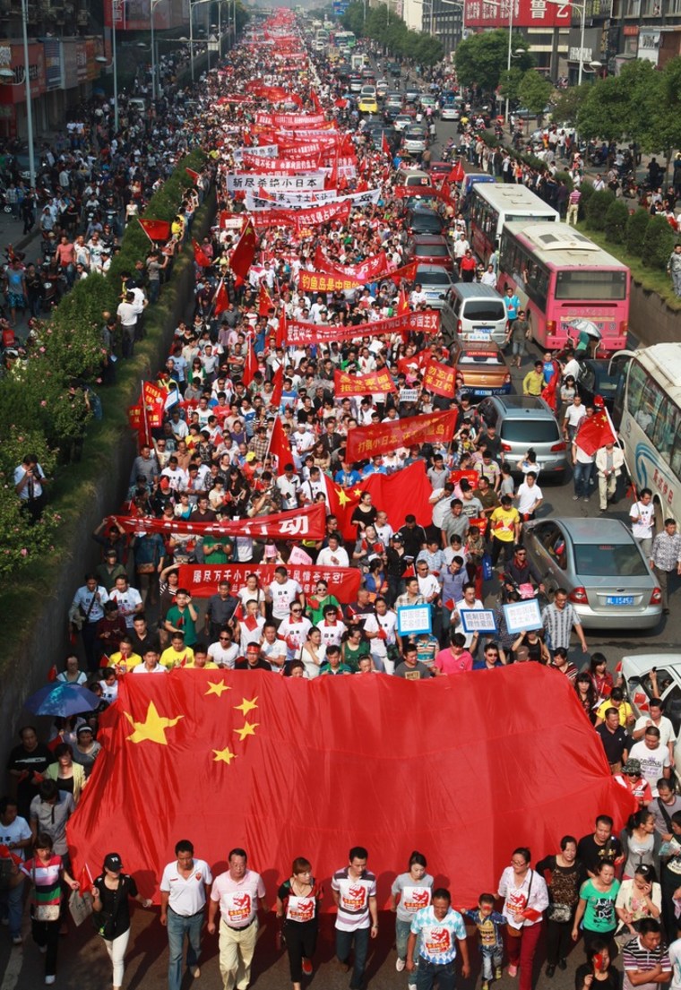 Thousands protest in China over disputed islands on the anniversary of ...