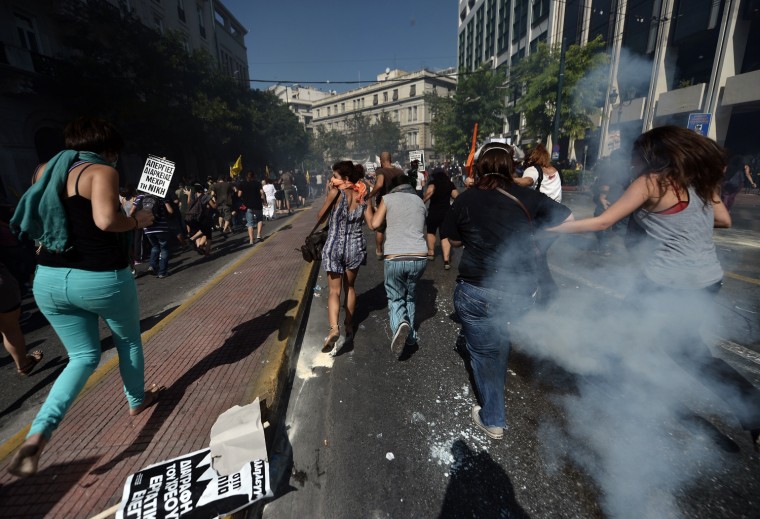Molotov cocktails ignite violent protests, clashes with Greek police ...