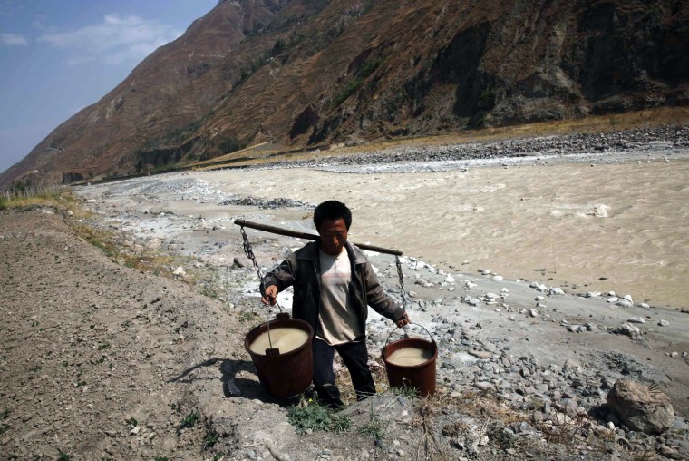 River turns white from pollution in China