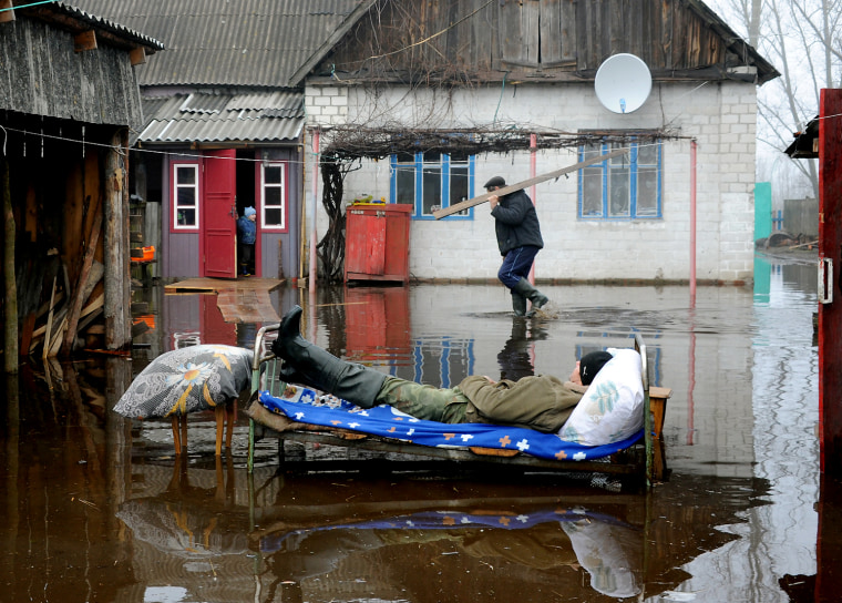Belarusian villager takes flooding from spring snow melt in stride