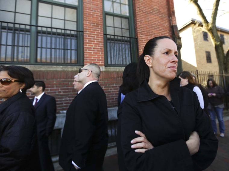 'Trying to be strong' for marathon victims, scores descend on memorial