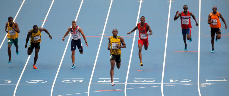 Usain Bolt dominates 200 meters, becomes first to win three world ...