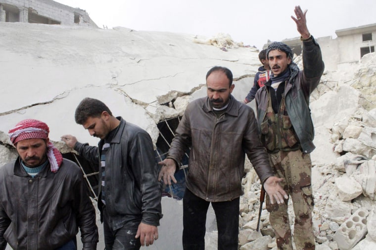 Syrian rocket destroys 3 buildings, kills 20, activists say