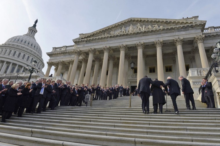 Steps of recovery: Senator who relearned how to walk climbs Senate stairs