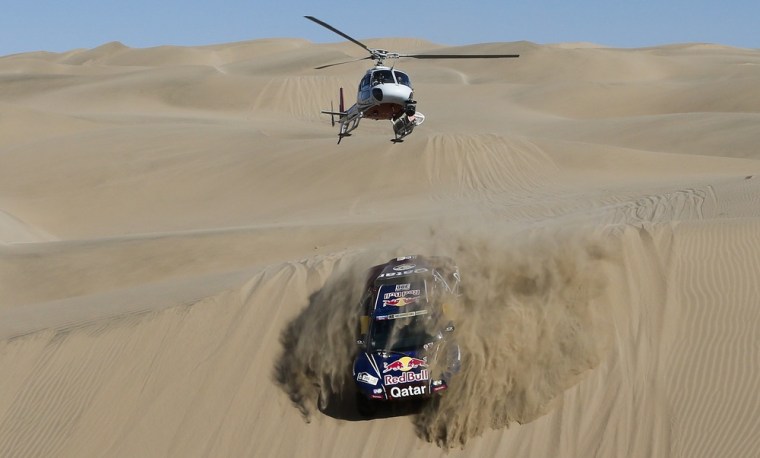 Dakar Rally drivers race across Peru's dunes during stage four