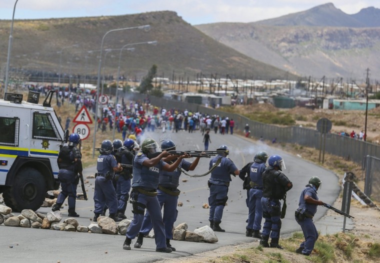 Police fire stun grenades at striking workers in South Africa's wine region