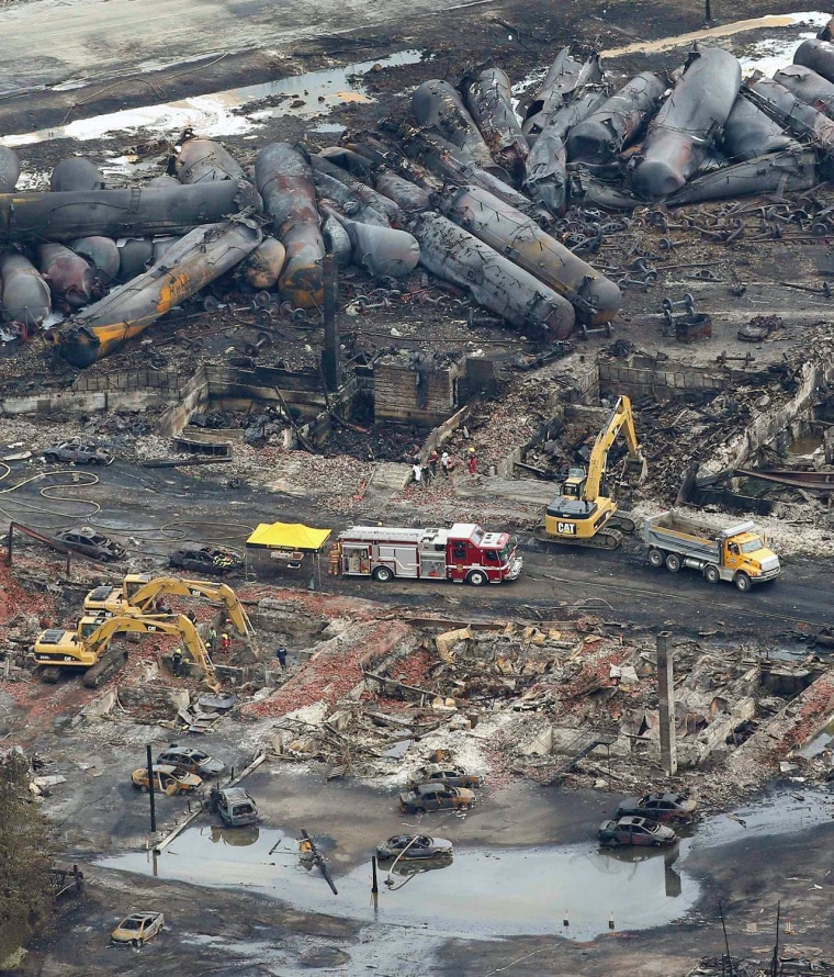 Explosion of derailed runaway train leaves ruins in small Quebec town
