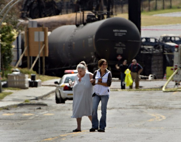 Explosion of derailed runaway train leaves ruins in small Quebec town