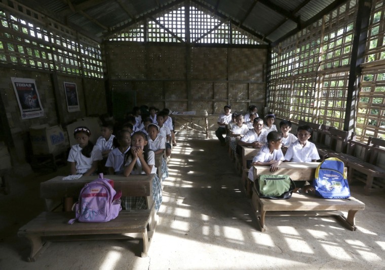 Tears flow on Filipino kids' first day at school
