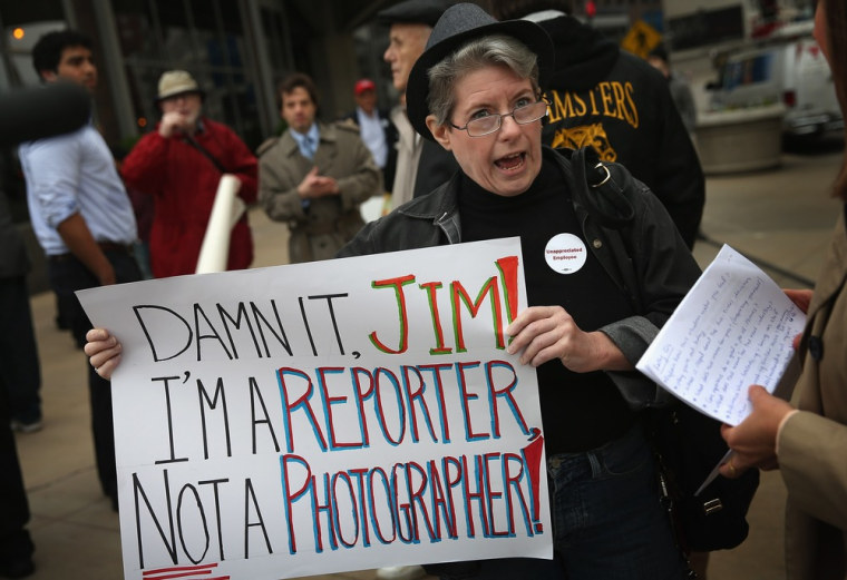 Oh snap! News photographers protest Chicago layoff