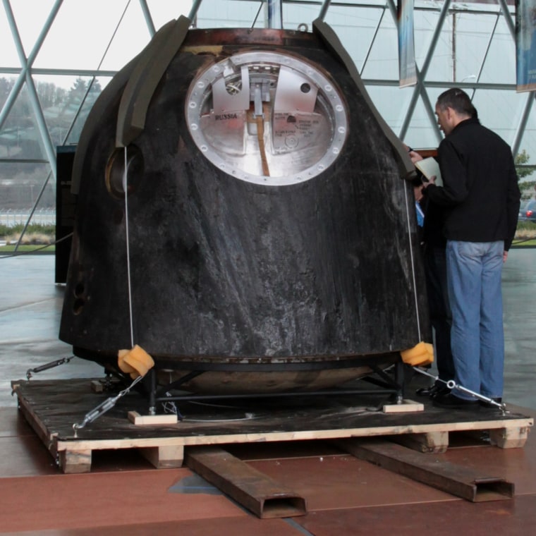 Billionaire's Soyuz spaceship lands in new home