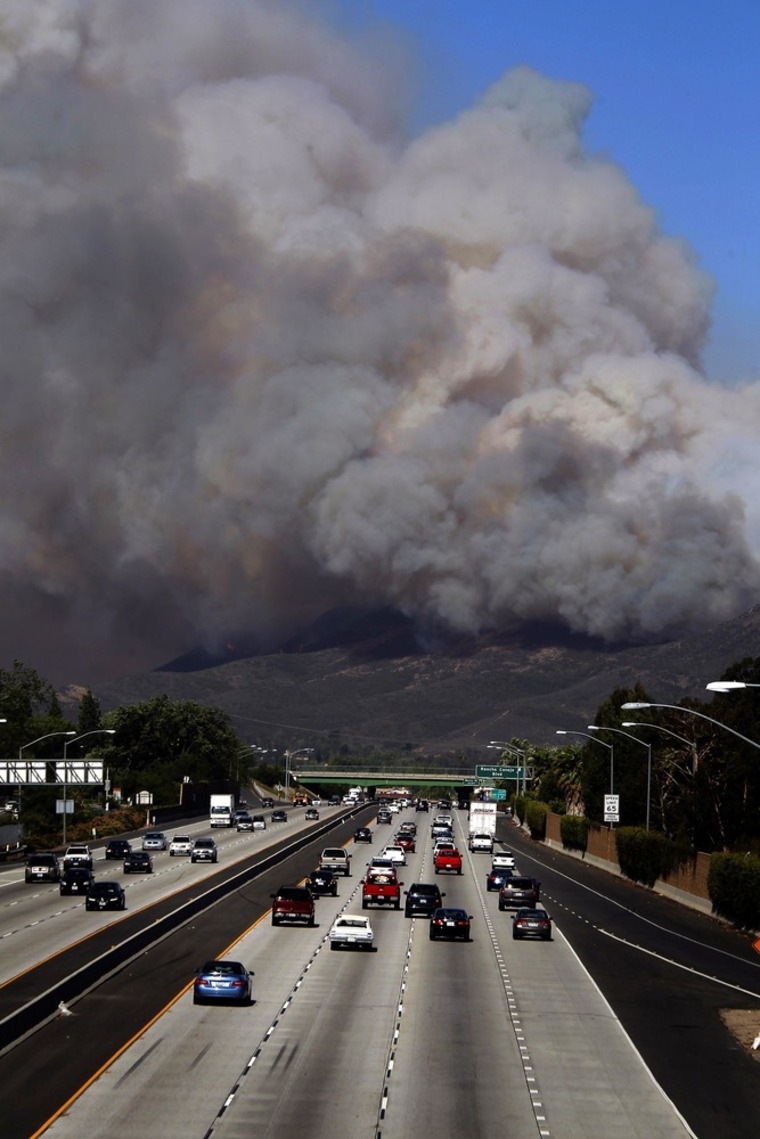 Wind whips up wildfires in southern California