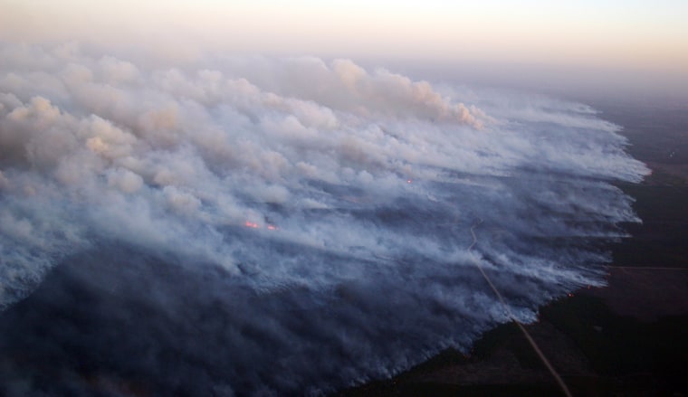 Wisconsin wildfire burns through nearly 50 structures