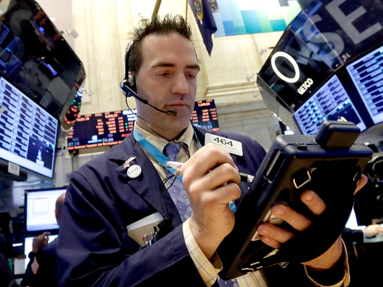 Stocks close up on upbeat economic data, central bank support