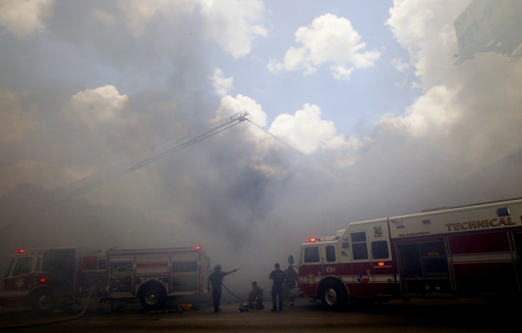 Four firefighters killed in Houston hotel blaze, say officials