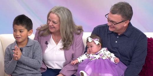 Crossing Guard Carries Student Across Flooded Chicago Street