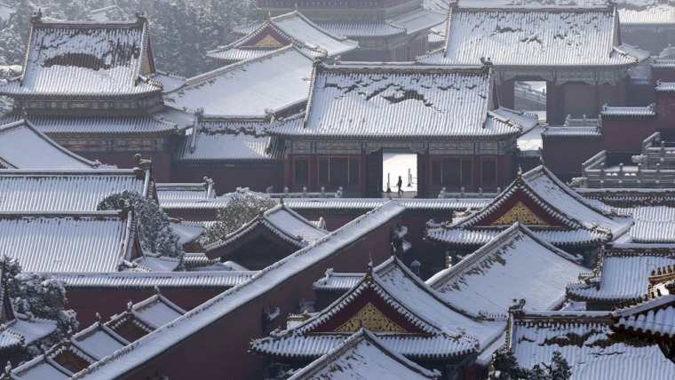 Beijing gets coated in rare spring snow