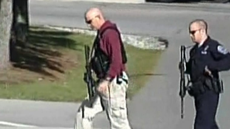 Two dead in Virginia Tech shooting, suspect remains loose