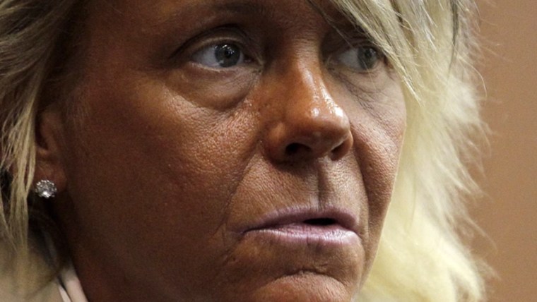 Bronzed mom pleads not guilty to tanning daughter
