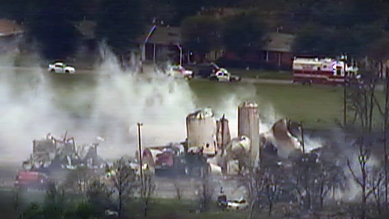 Fertilizer plant still smoking after explosion